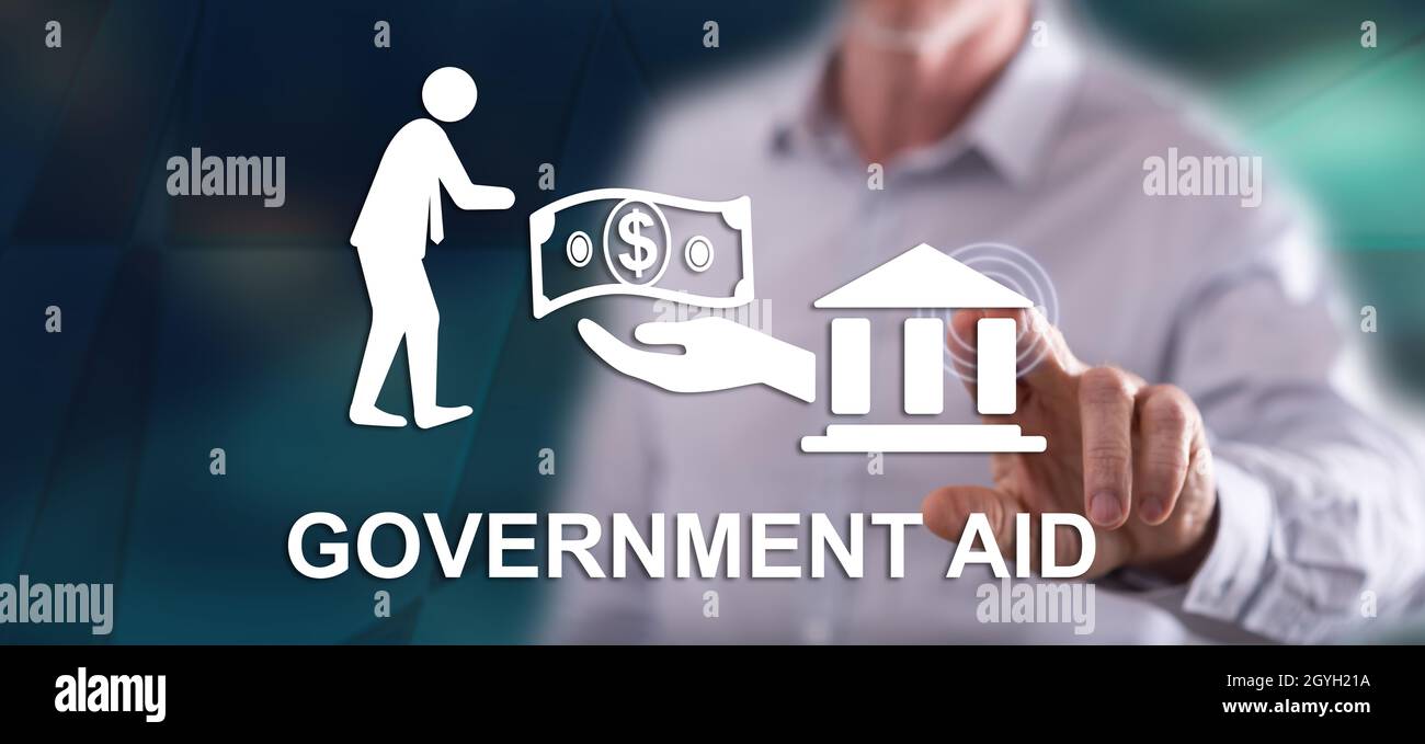 Man touching a government aid concept on a touch screen with his finger ...