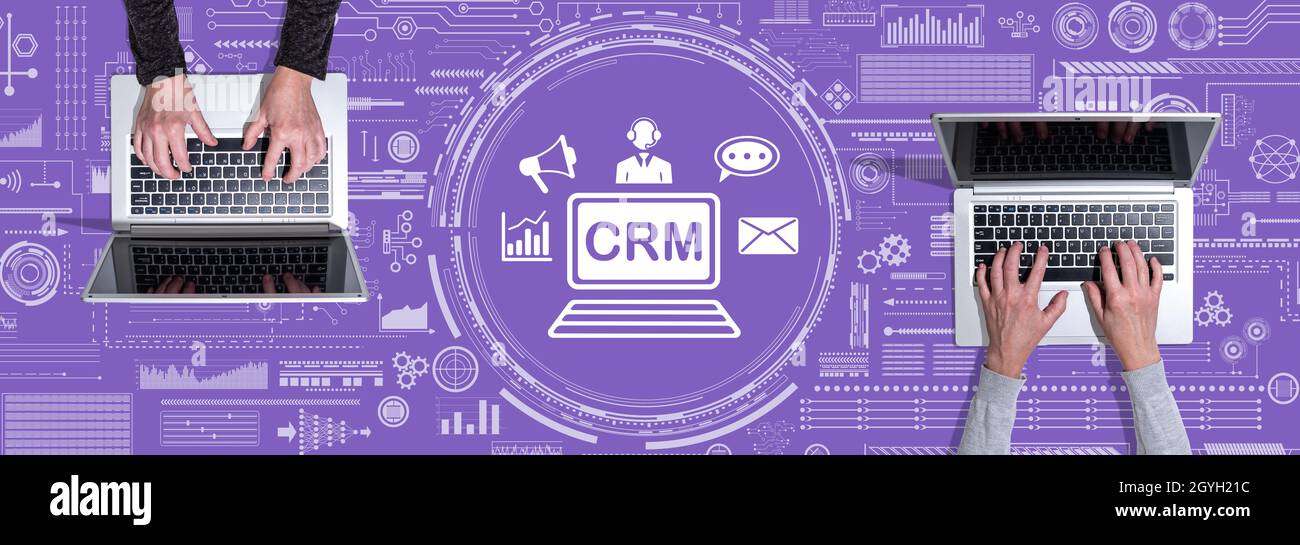 Top view of hands using laptop with symbol of crm concept Stock Photo ...