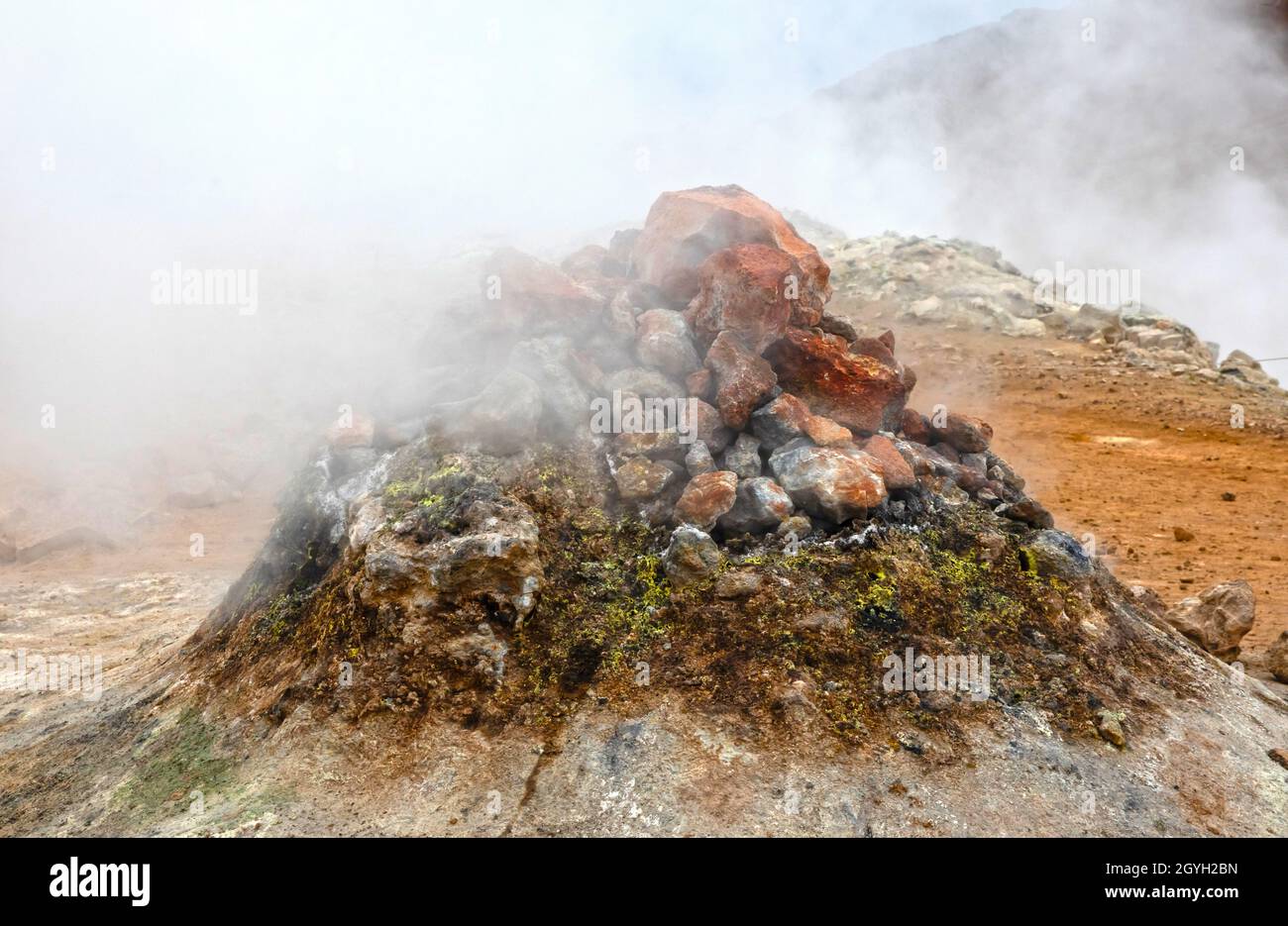 Steaming fumarole in geothermal area of Hverir, Namafjall in northern ...