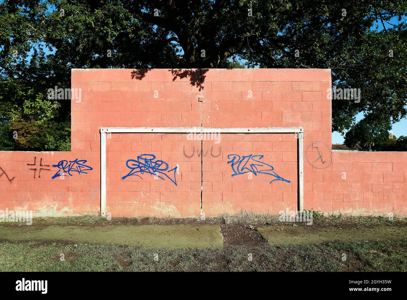 Goal posts on a wall Stock Photo - Alamy