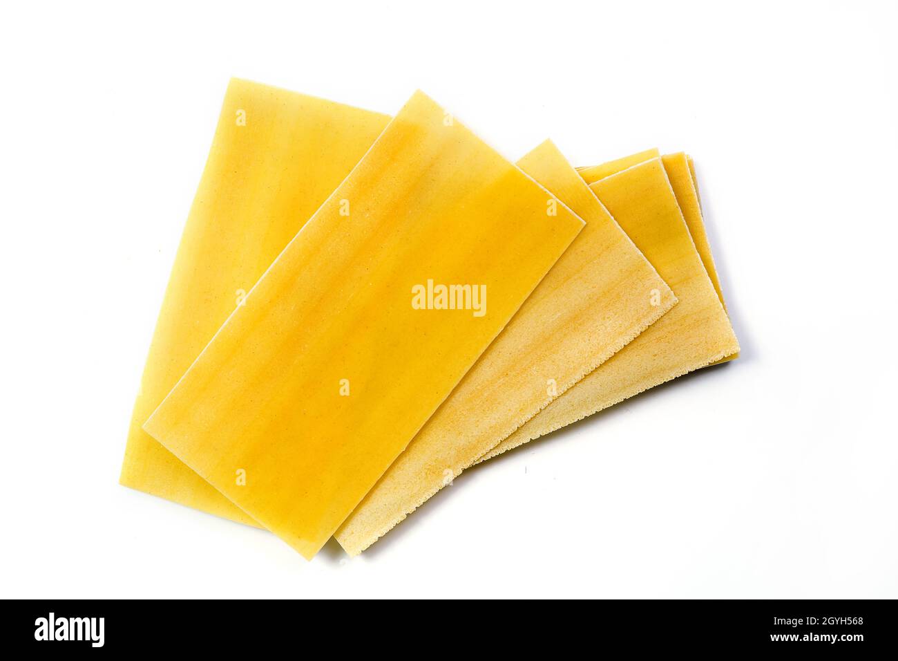 Uncooked raw lasagna pasta isolated on white background. Stack of dried ...