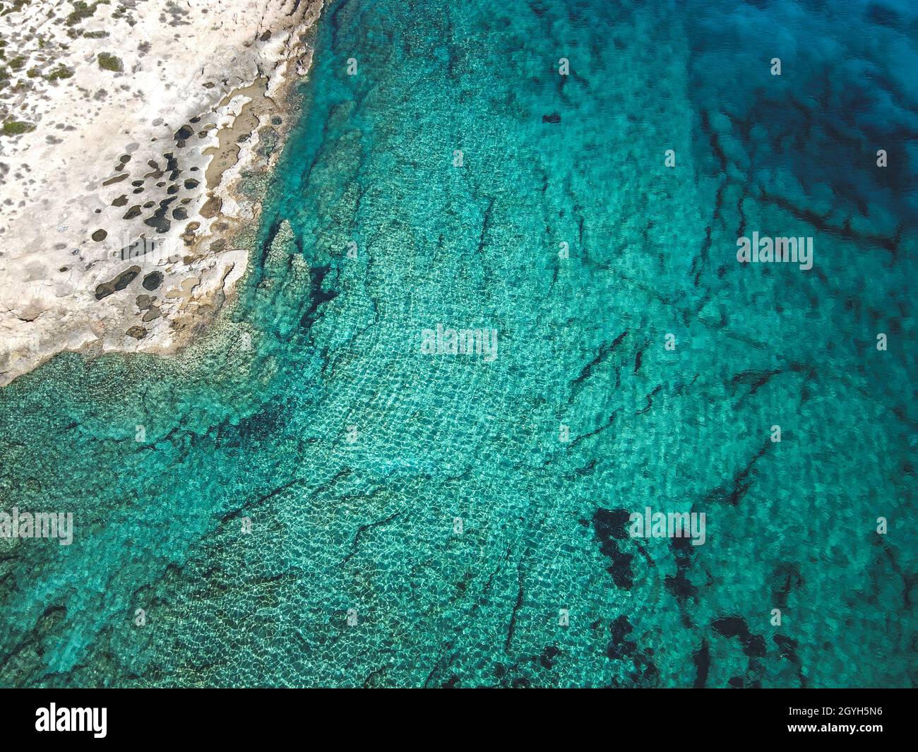 Aerial view of the beautiful pure clean blue sea water at the coast ...