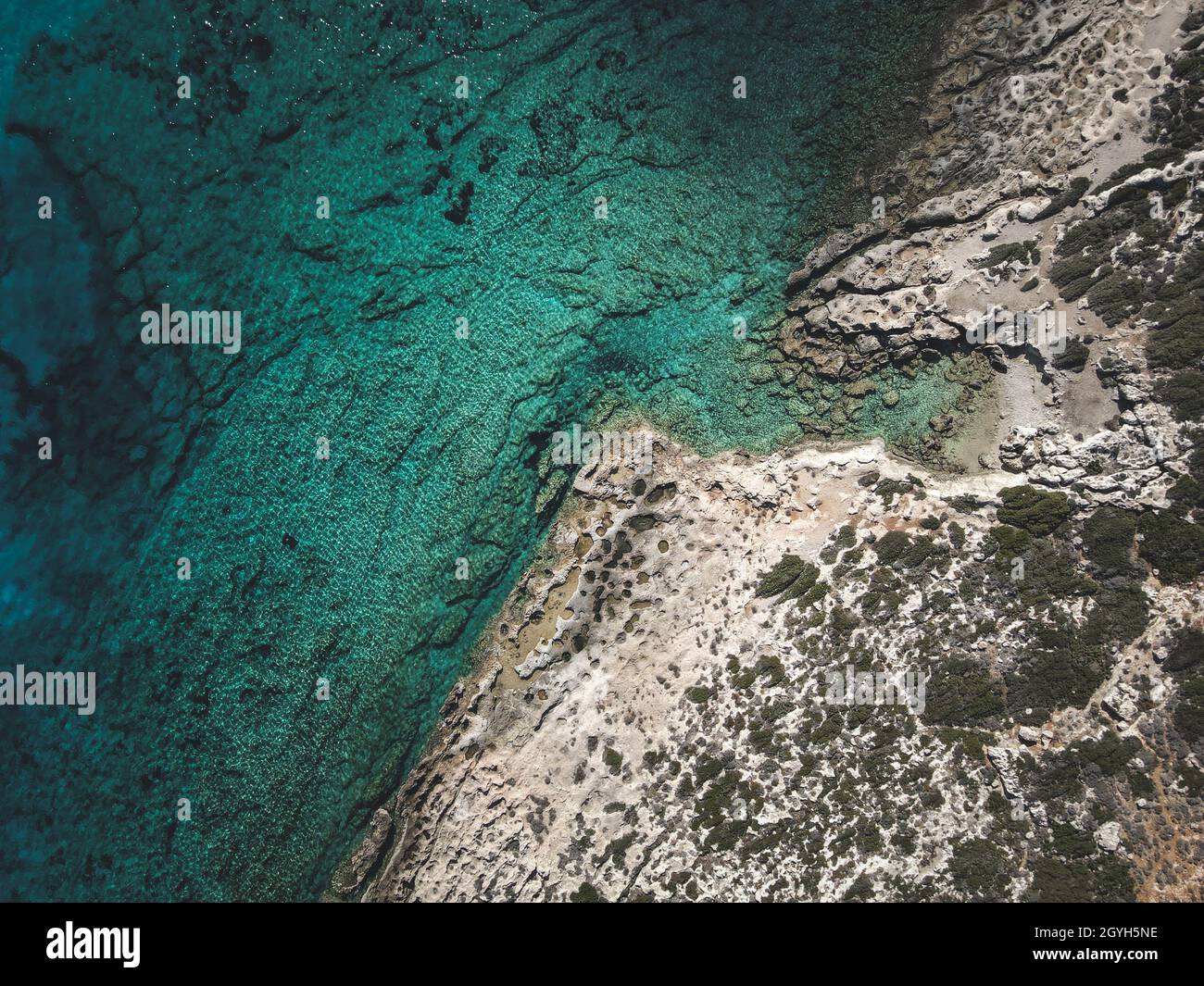 Aerial view of the beautiful pure clean blue sea water at the coast ...