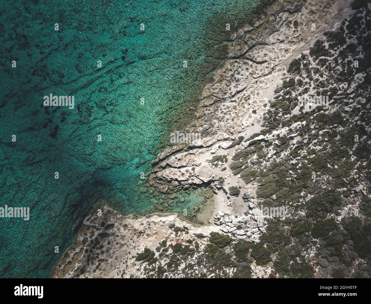 Aerial view of the beautiful pure clean blue sea water at the coast ...