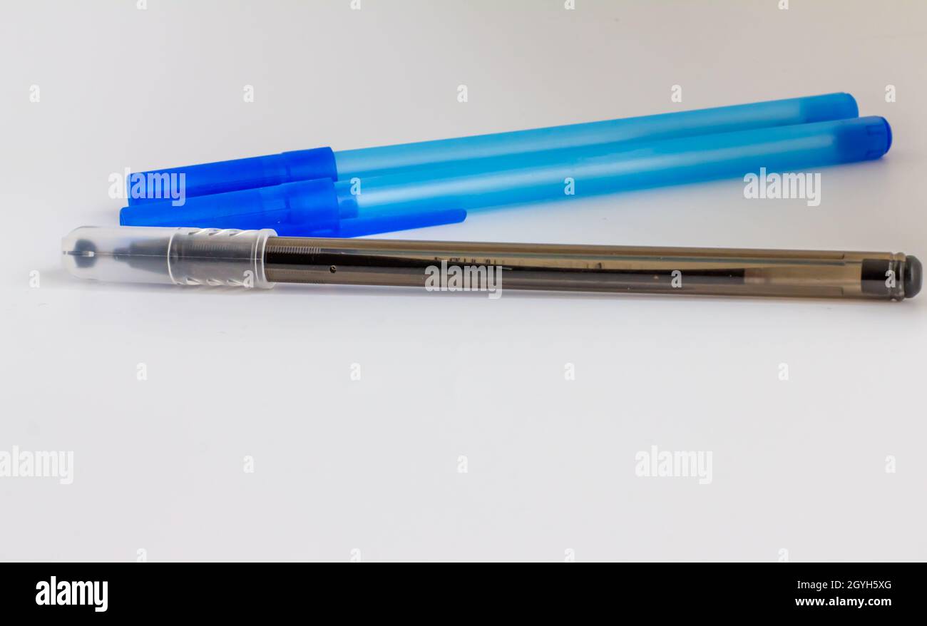 3 ballpoint pens with blue and black caps,isolated on white background ...