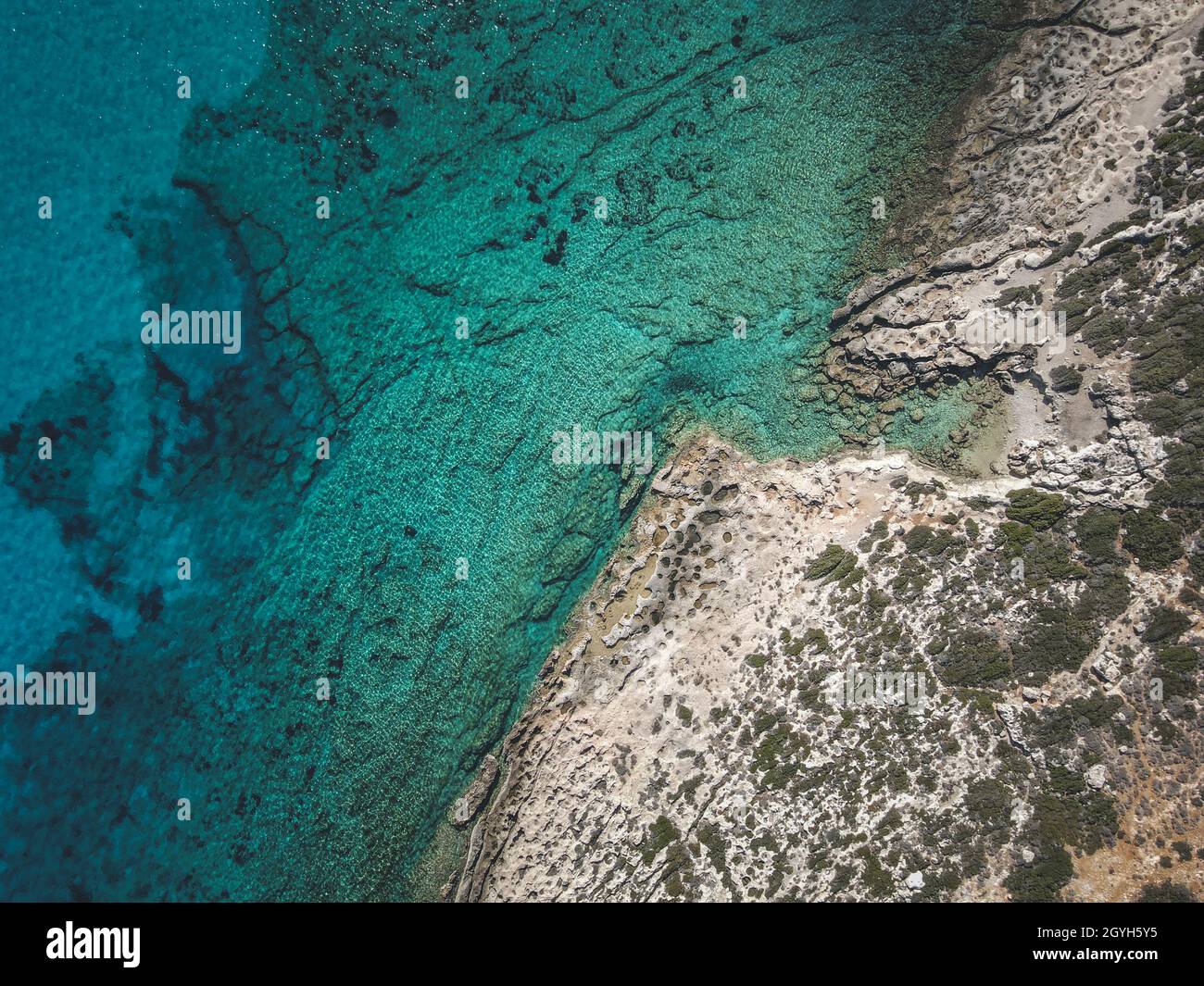 Aerial view of the beautiful pure clean blue sea water at the coast ...