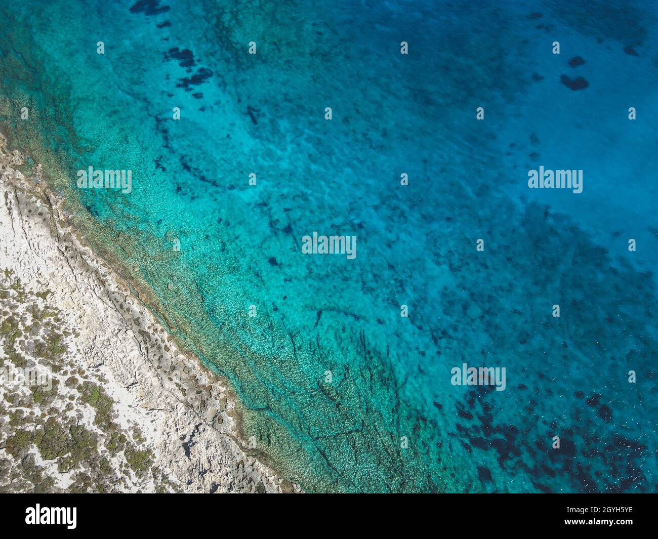 Aerial view of the beautiful pure clean blue sea water at the coast ...