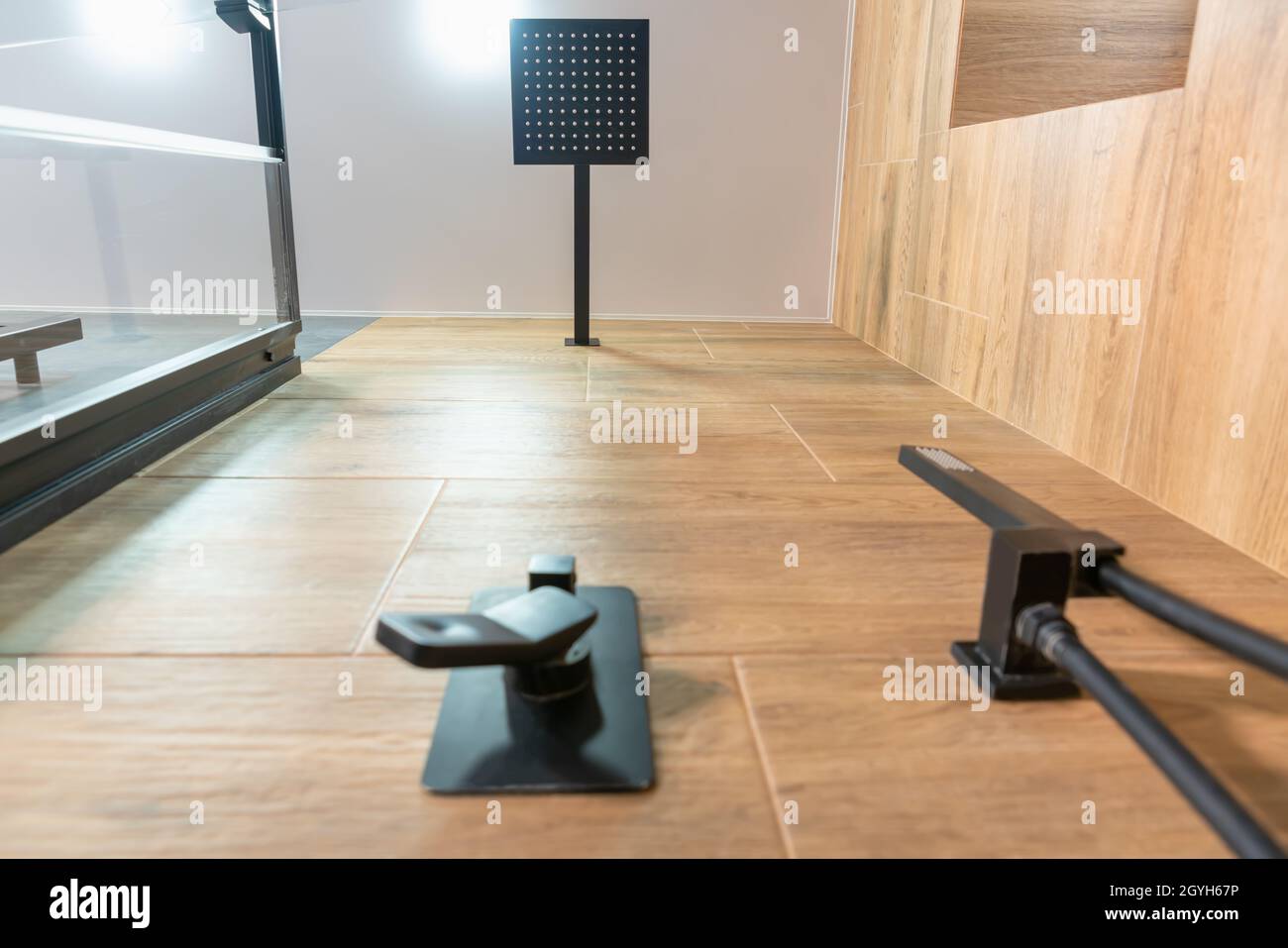 View looking up the tiled wall of a show at the modern rectangular ...