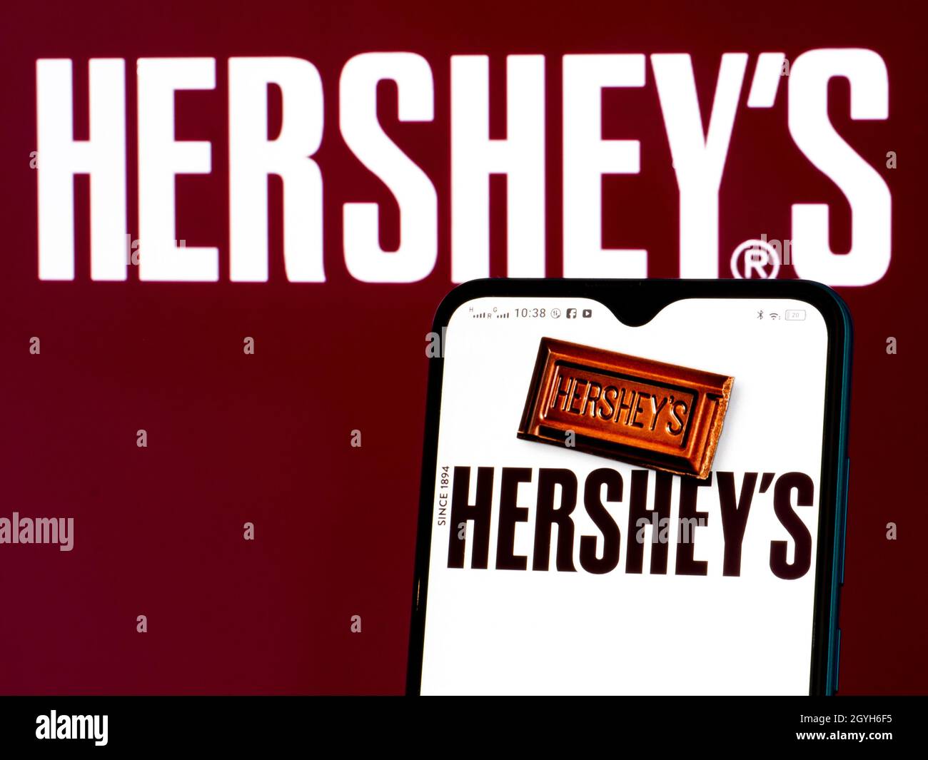 In this photo illustration The Hershey Company logo seen displayed on a smartphone Stock Photo ...