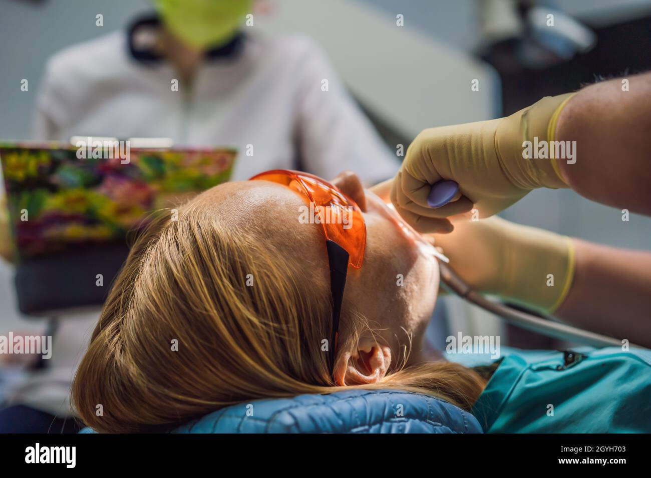 Woman having teeth examined at dentists. Dental treatment in dentistry ...