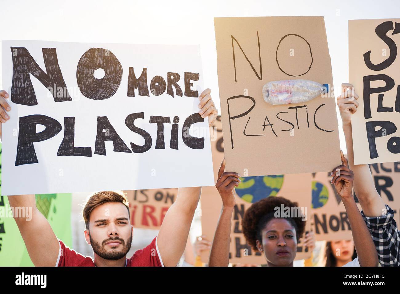 Young group of demonstrators on road from different culture and race ...