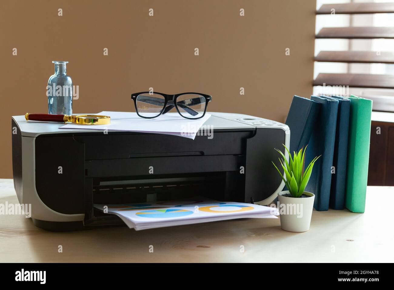 Close up of an office table with printer on it Stock Photo - Alamy