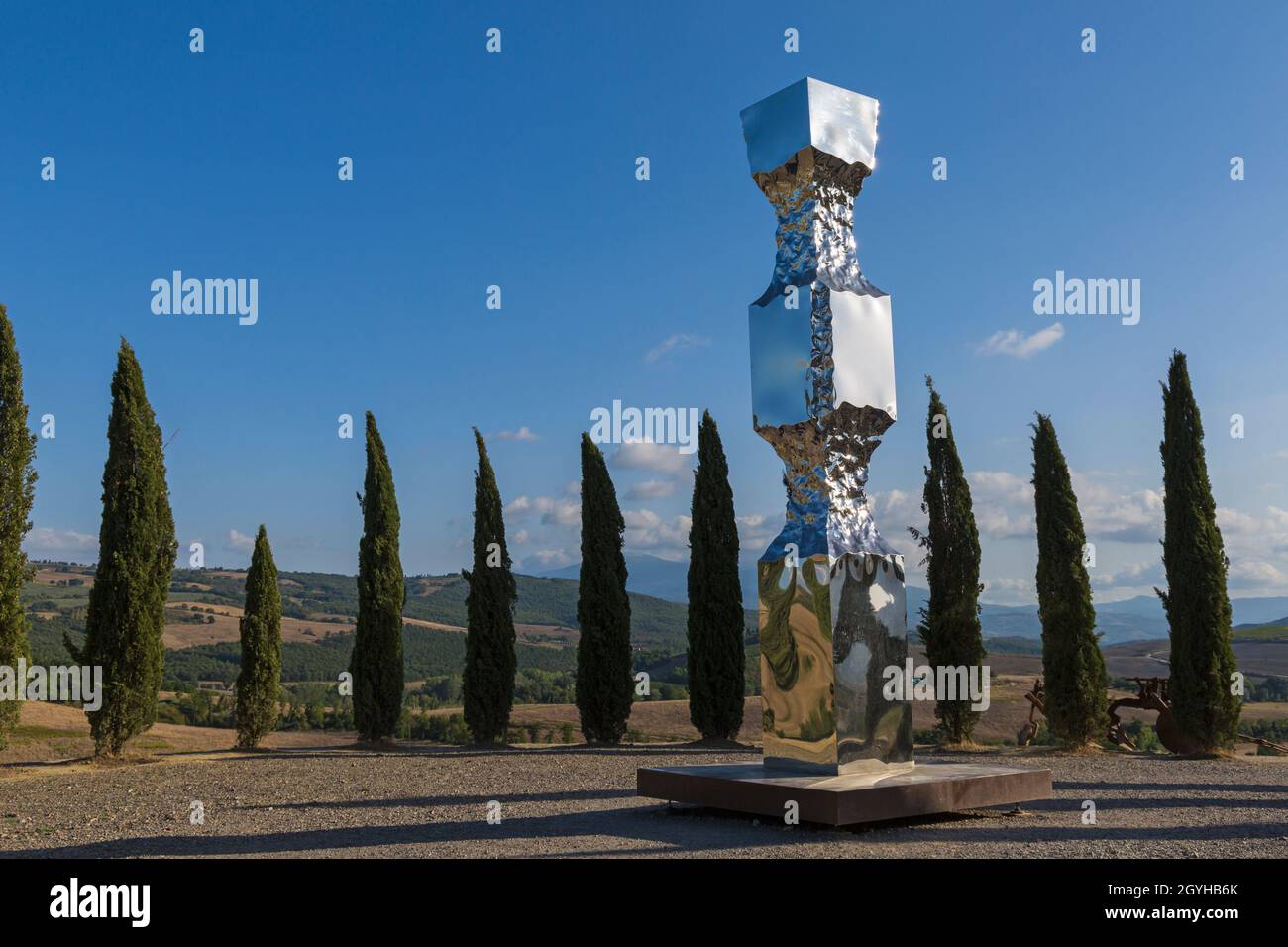 Ionic column by Helidon Xhixha among cypress trees at I Cipressi di San ...