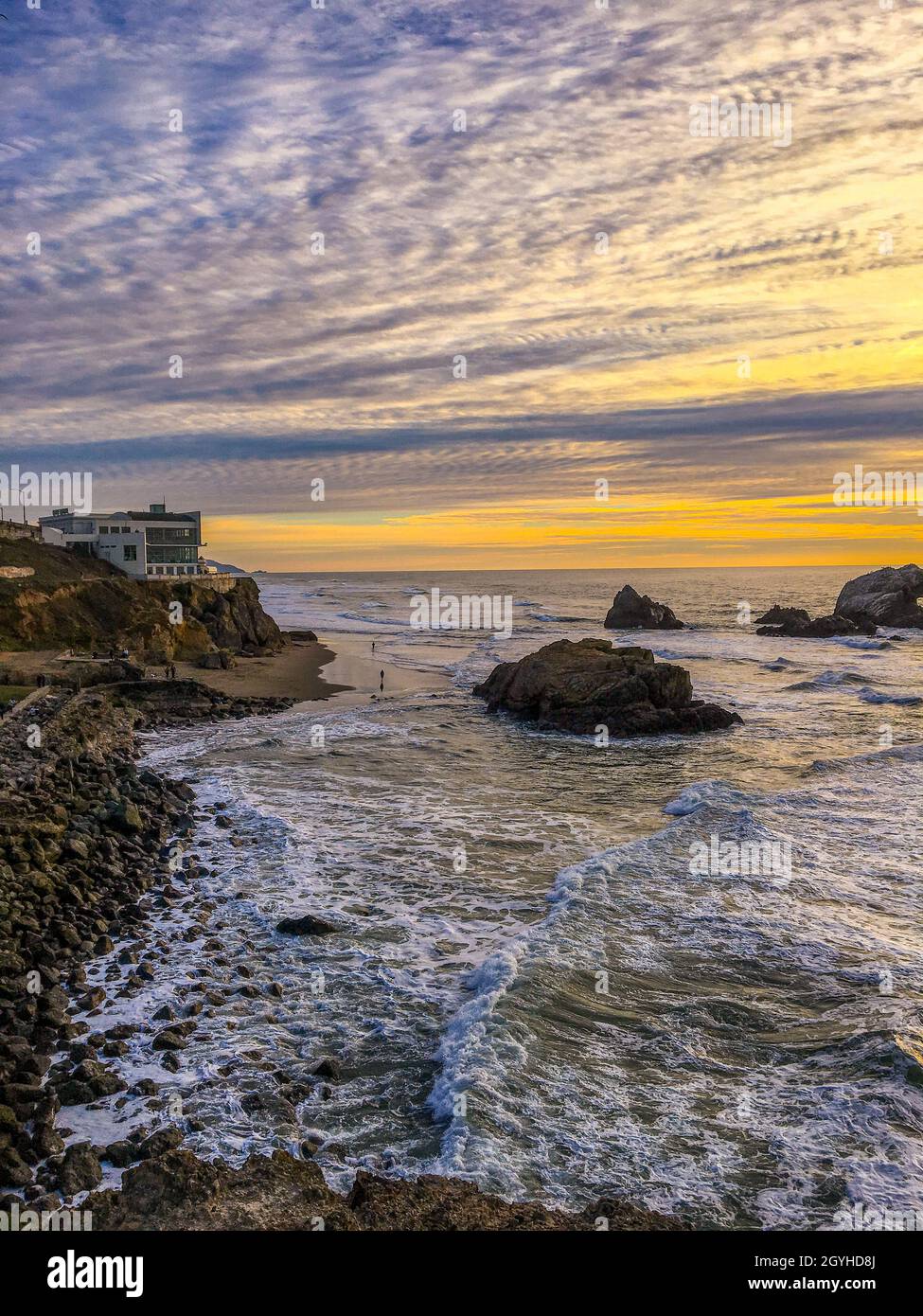 Rocky beach in San Francisco on the sunset Stock Photo - Alamy