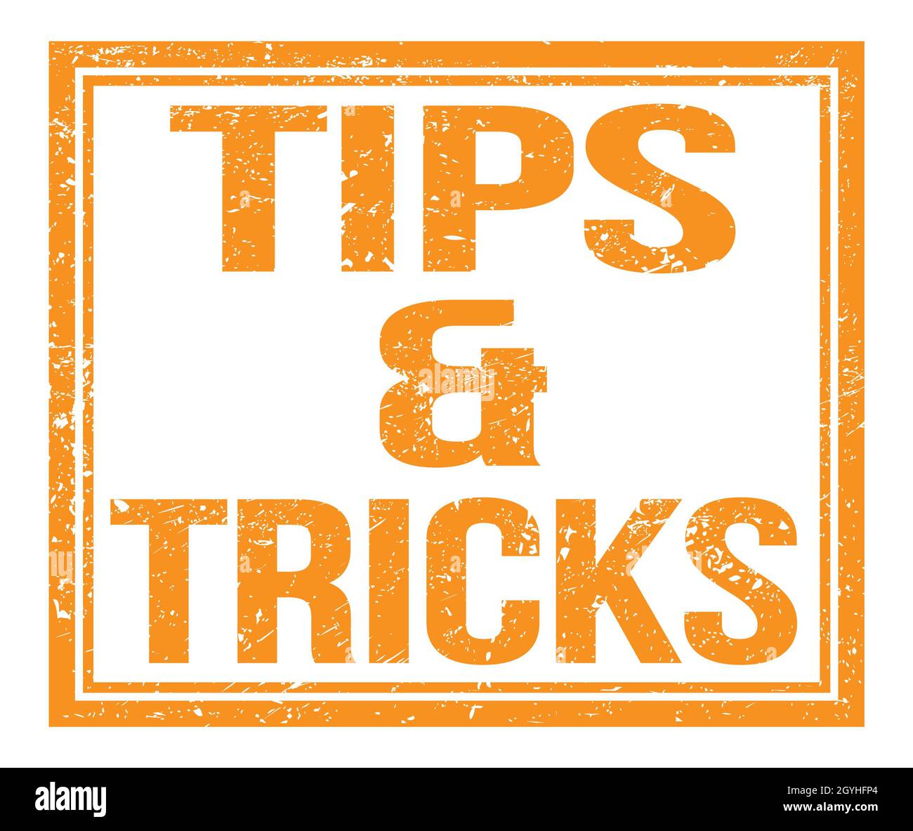 TIPS & TRICKS, written on orange grungy stamp sign Stock Photo - Alamy