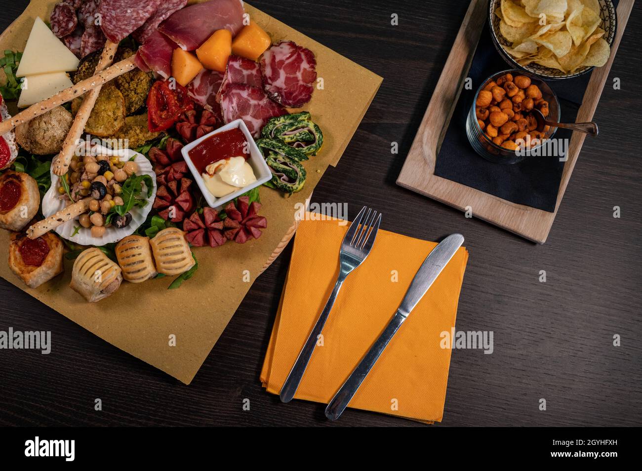 composition of mixed appetizer with coktail on a cutting board Stock ...