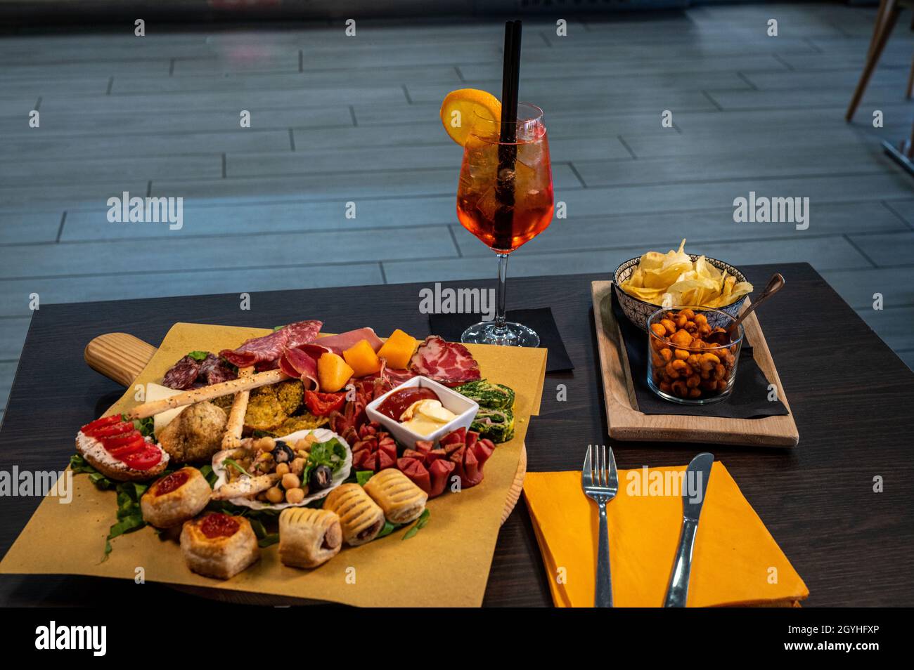 composition of mixed appetizer with coktail on a cutting board Stock ...
