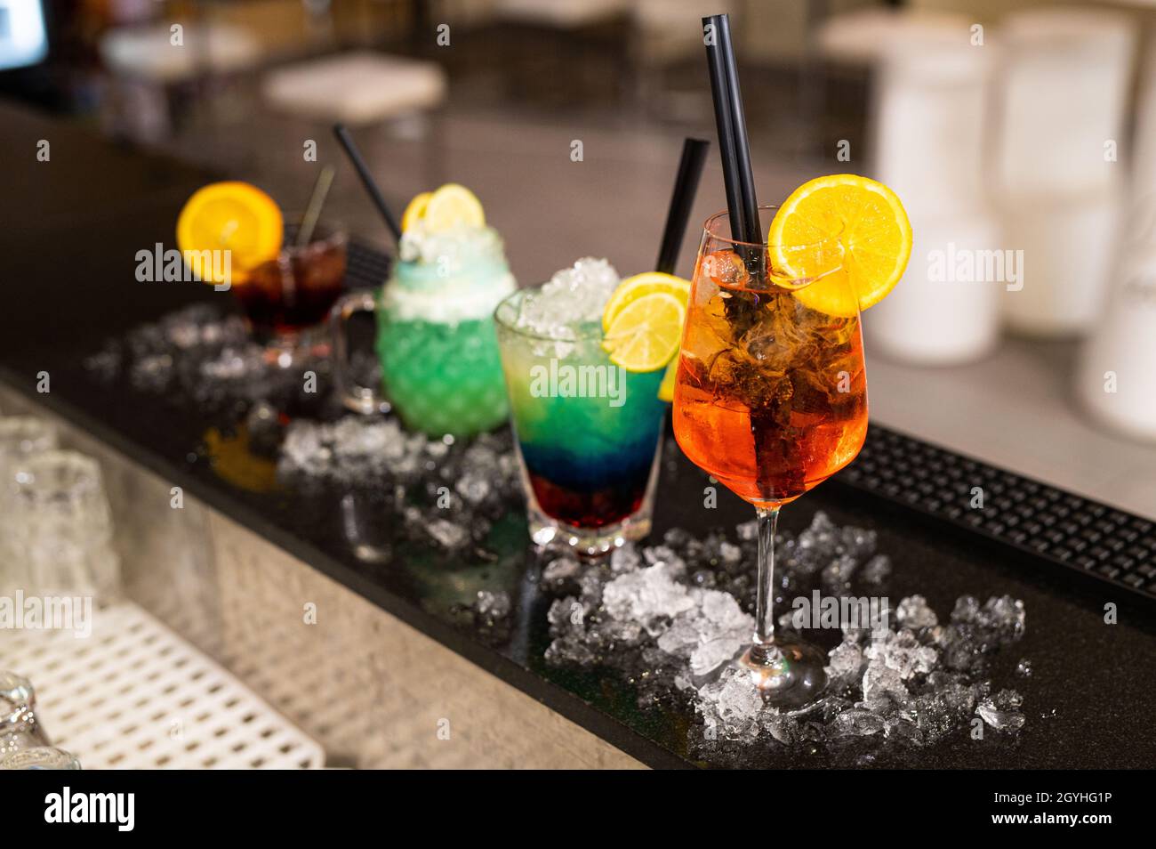 composition of various cocktails on the counter in strong colors and ...