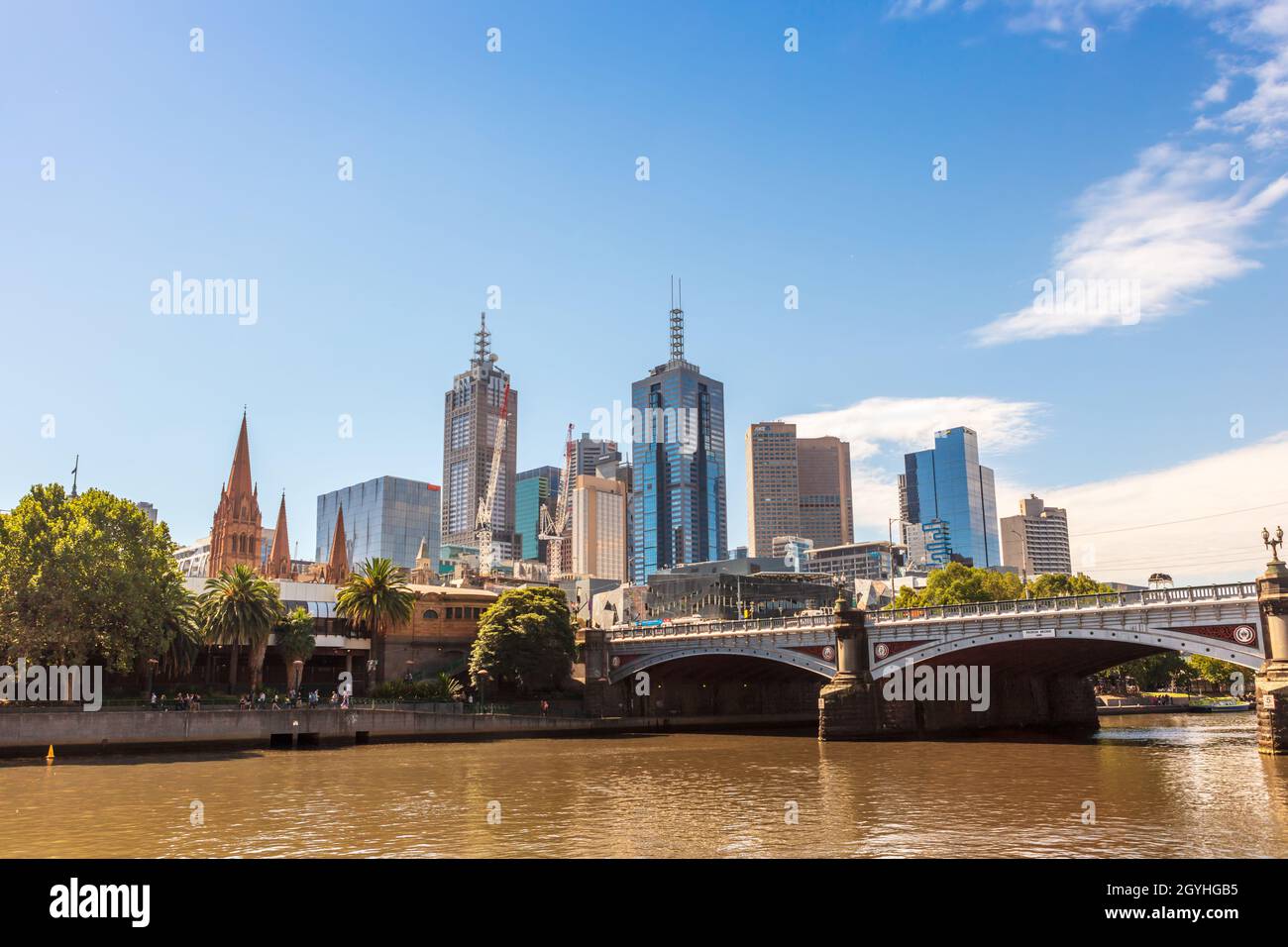 Modern buildings and historic Princes Bridge in central Melbourne ...