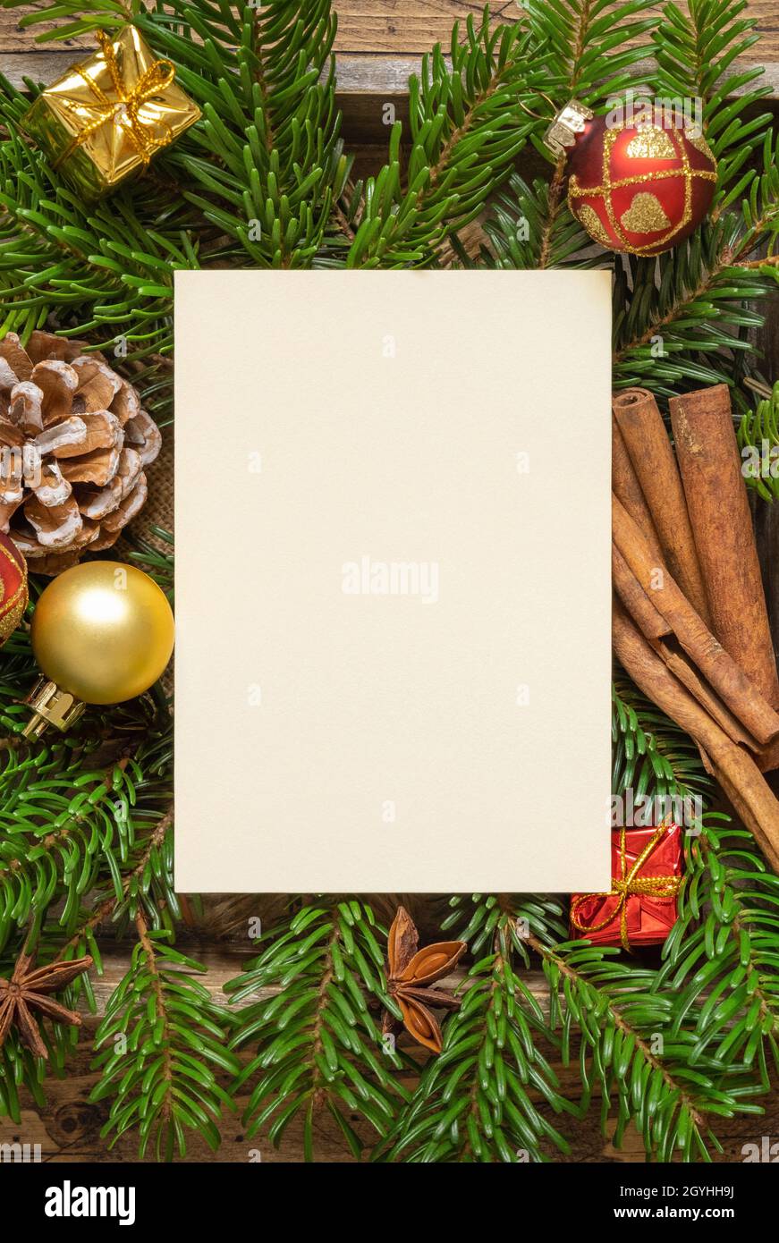 Winter Christmas Composition with a blank card, fir branches and ...