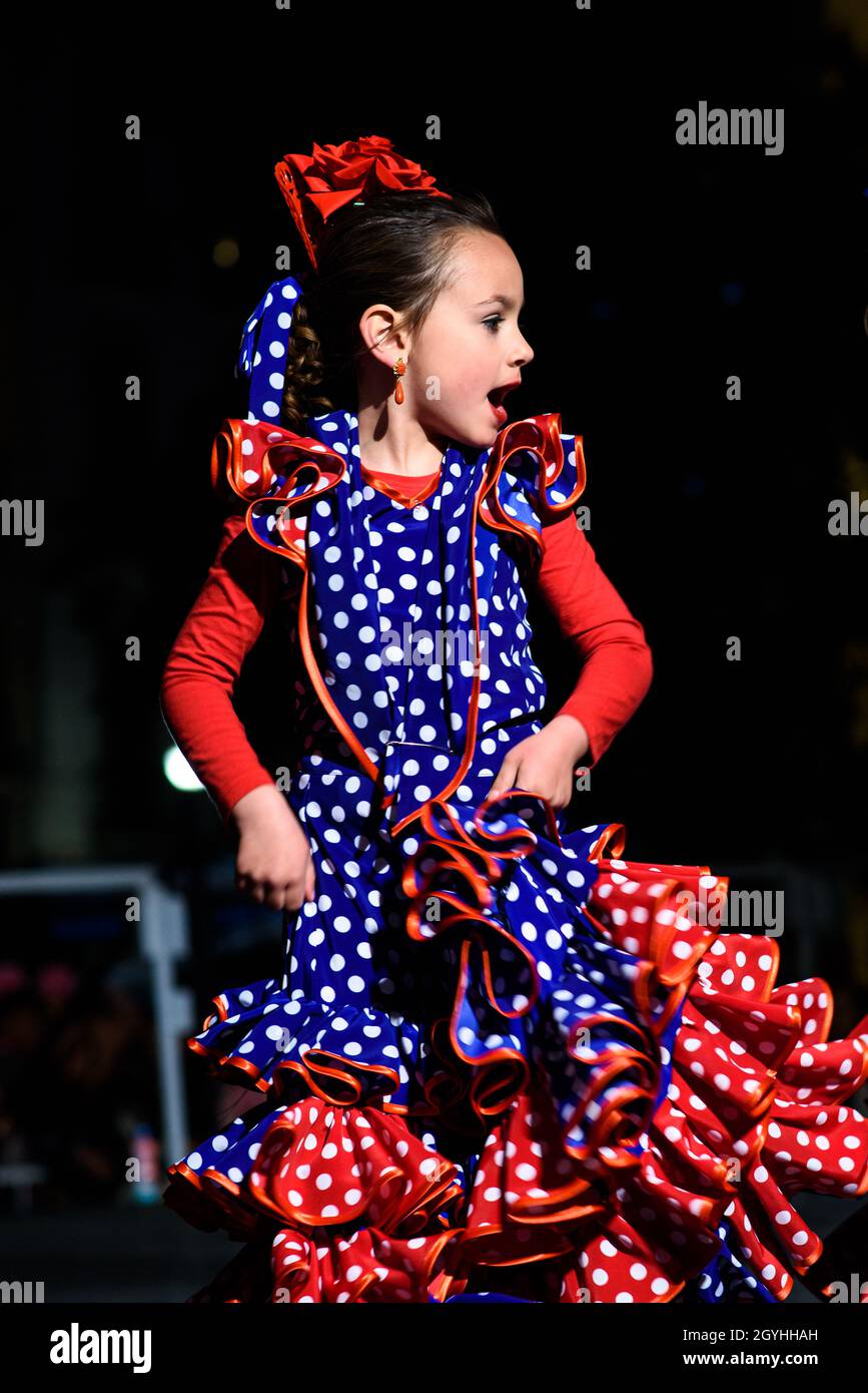 Little girl performing a spanish flamenco dance on a stage Stock Photo ...