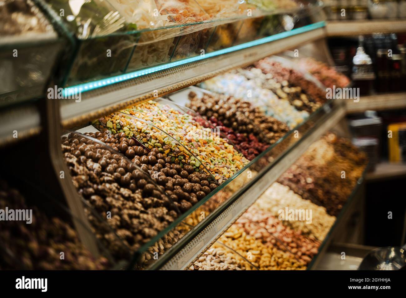 perspective view closeup of rows of assorted chocolate candy ...