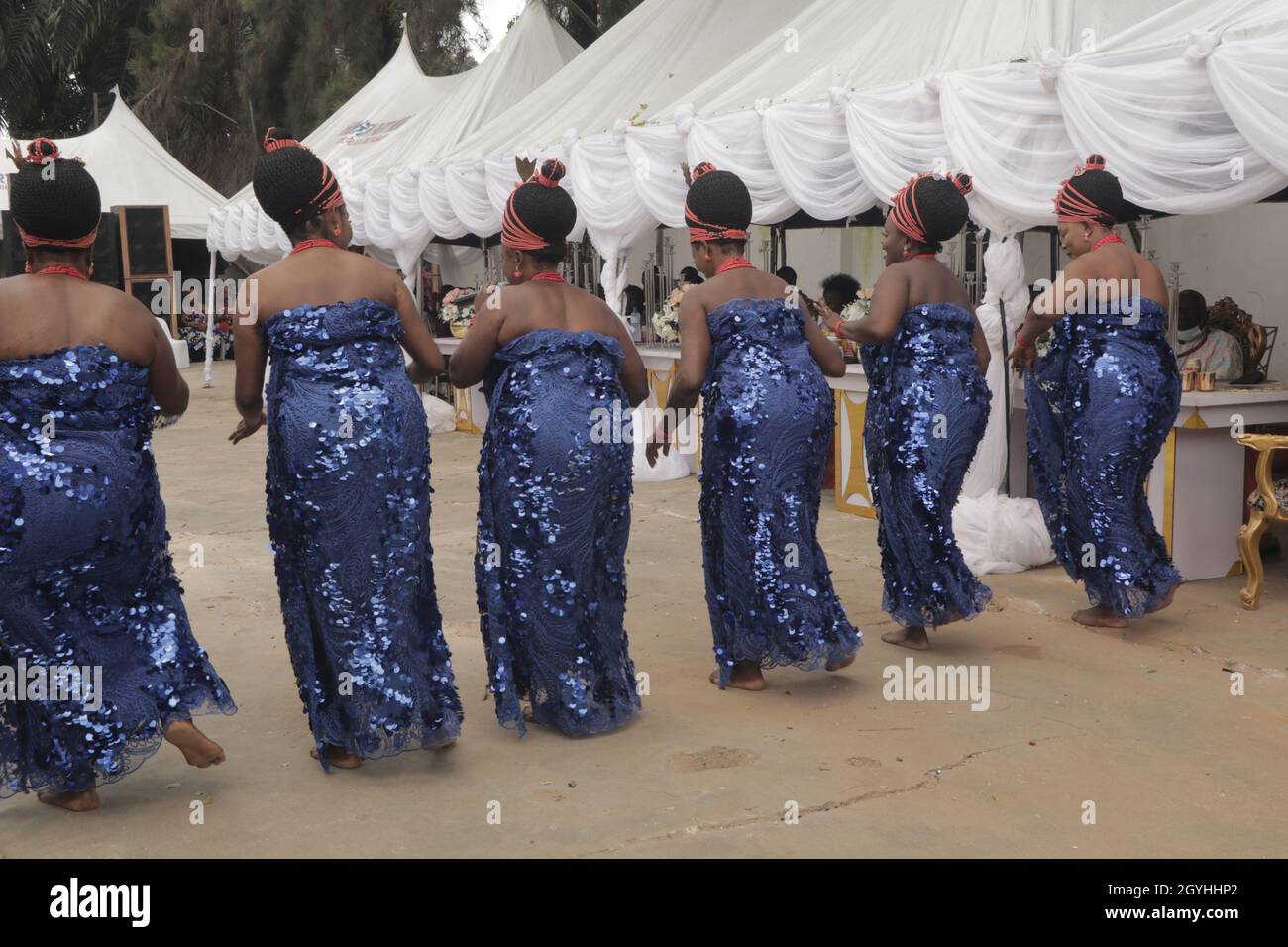 Women in Benin Kingdom do a traditional dance during an exhibition of ...