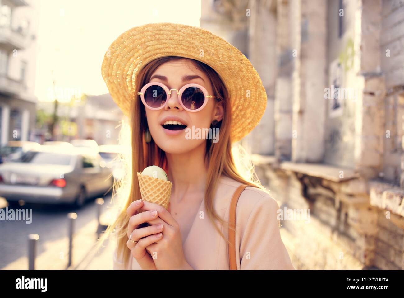 attractive woman outdoor walk eat ice cream walk travel Lifestyle Stock ...