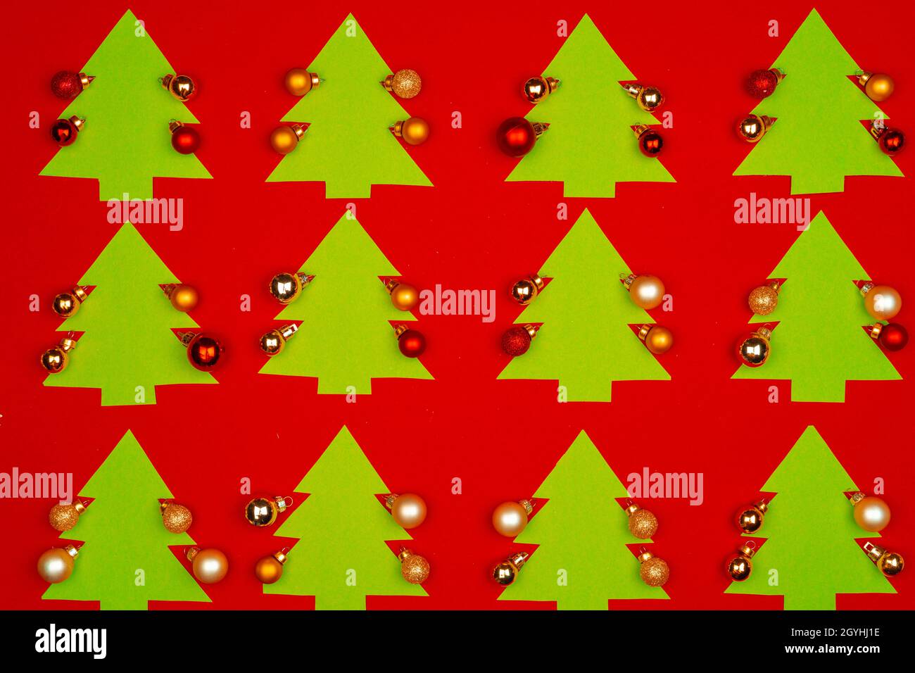 Christmas pattern of holiday decorations on red background Stock Photo ...