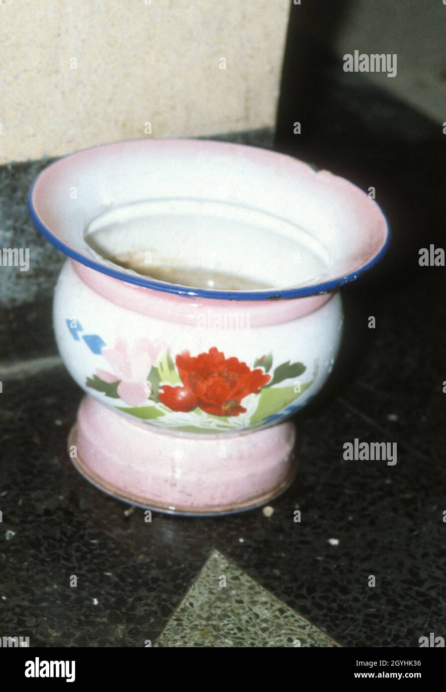 SPITTOON made for spitting into and can be seen all over in public ...