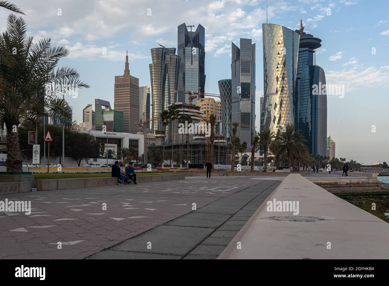 Doha corniche daylight view in west Bay area with skylines and clouds ...