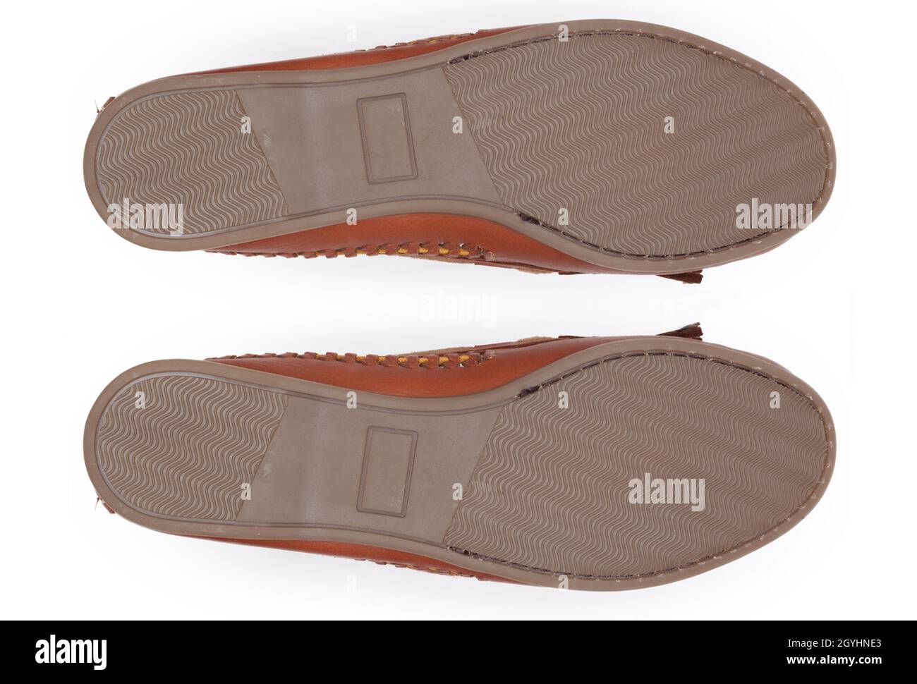Bottom of shoes, isolated on white background Stock Photo - Alamy