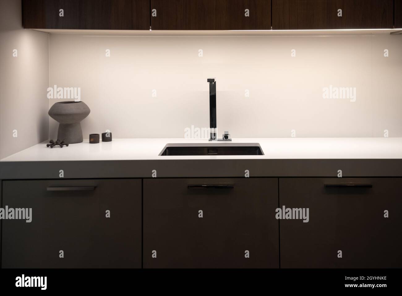 Low Key Bespoke Kitchen Counter Top Stock Photo - Alamy