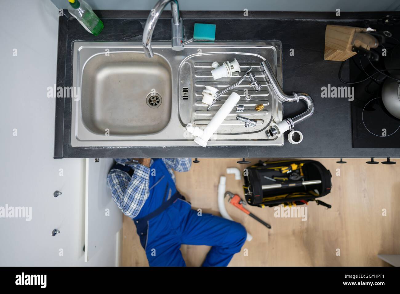 Plumber Fixing Kitchen Pipes. Water Sink Service Stock Photo - Alamy