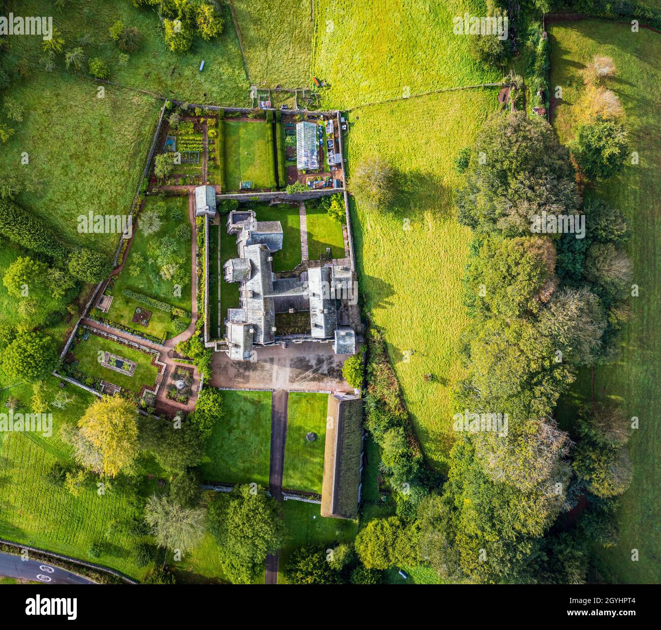 Top Down panorama of Compton Castle from a drone, Devon, England ...