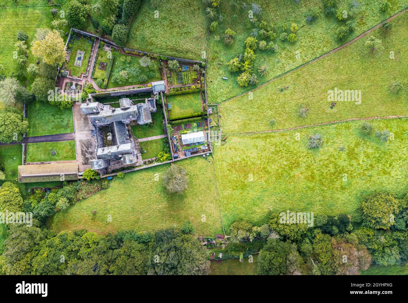 Top Down panorama of Compton Castle from a drone, Devon, England ...