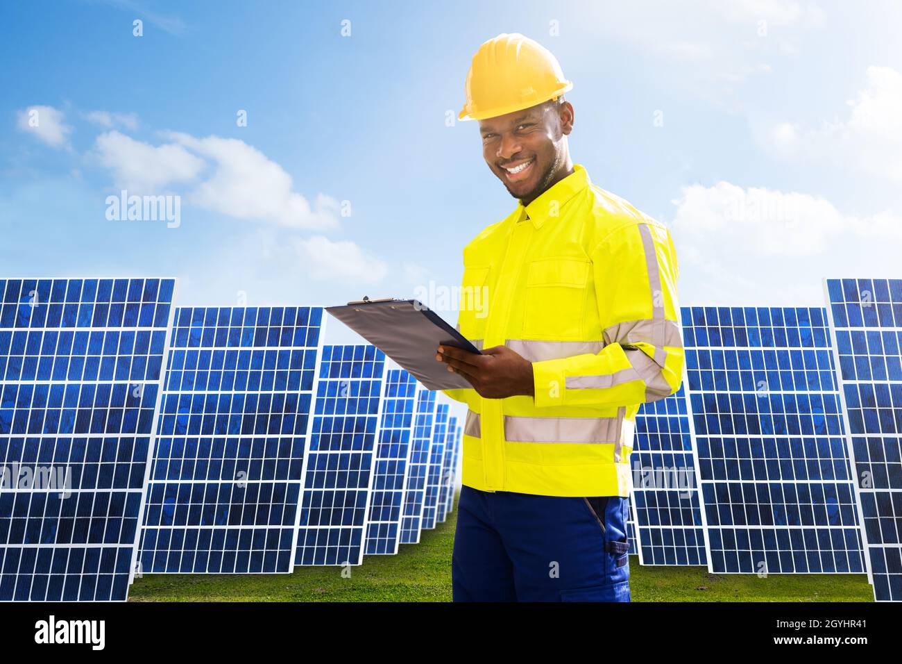 Photovoltaic Green Energy Technology. Worker At Solar Panel Plant Stock ...