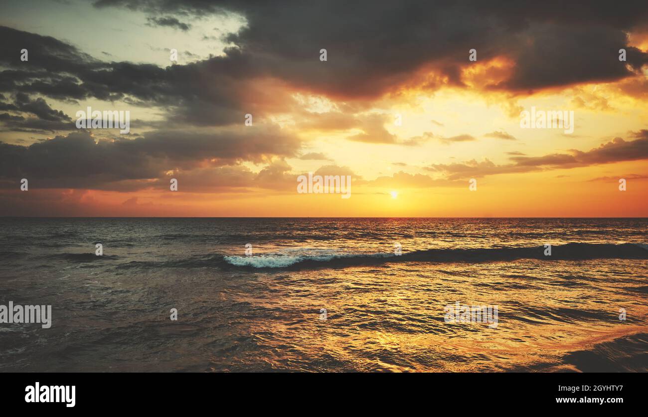 Beautiful sunset over water waves hi-res stock photography and images ...