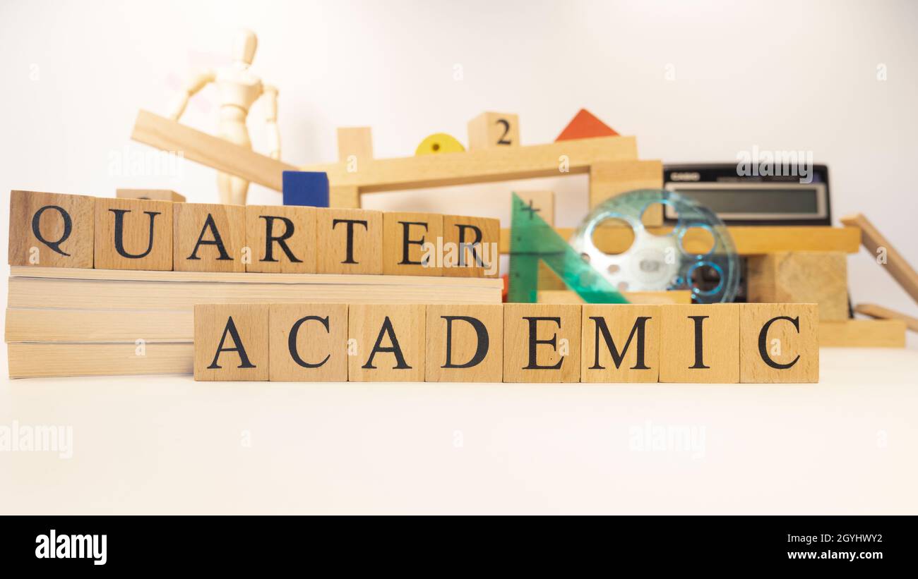 The word academic quarter was created from wooden cubes. Close-up Stock ...