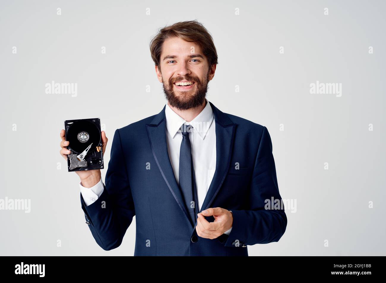 business man in suit and technology hard drive information Stock Photo ...
