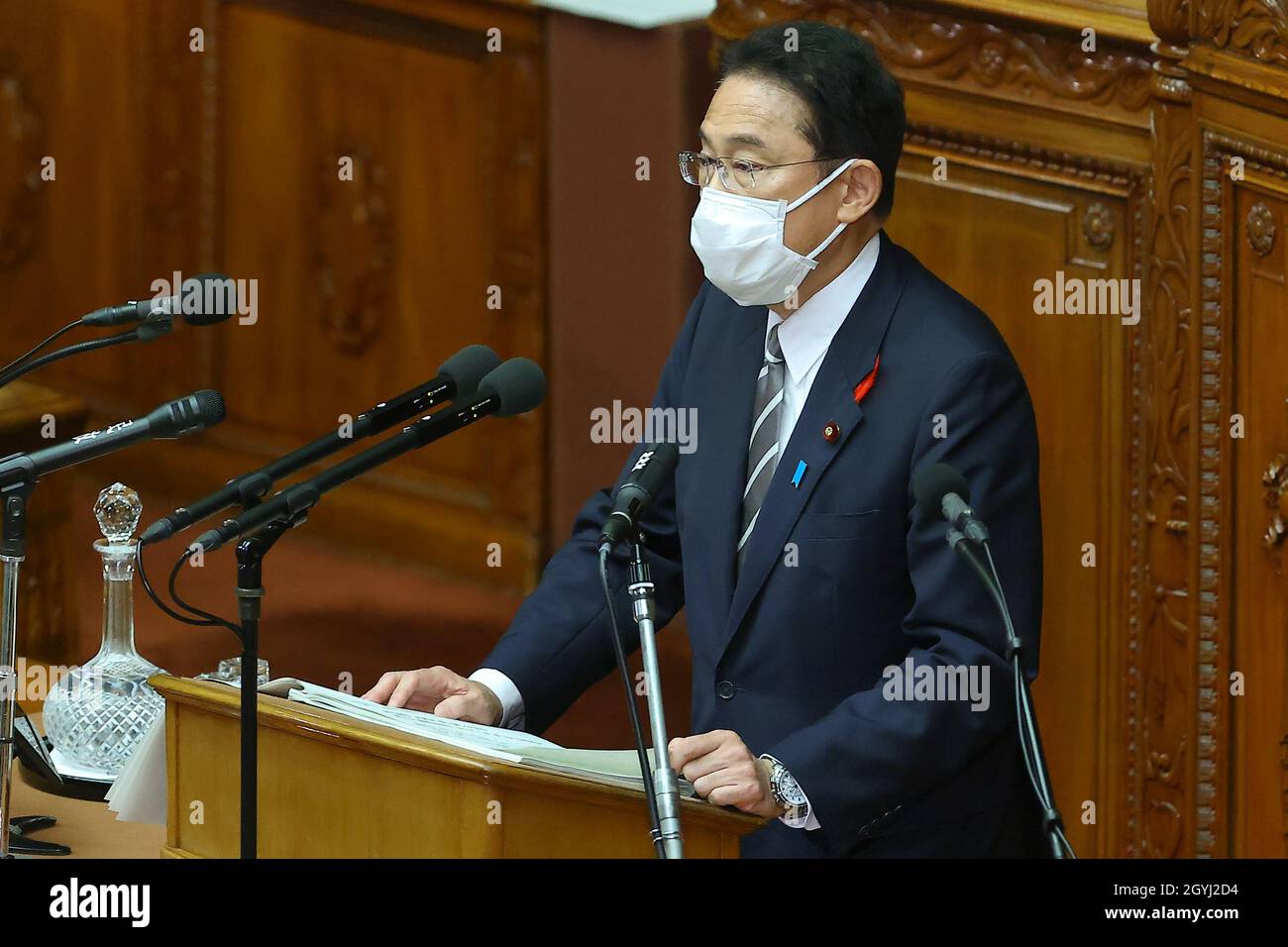 Japan's Prime Minister Fumio Kishida delivers his first policy speech to the extraordinary Diet ...
