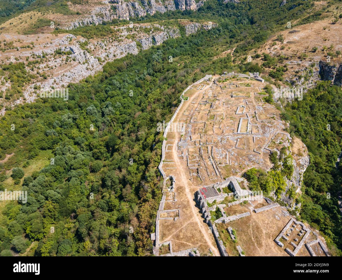 Aerial view of Ruins of medieval fortificated city of Cherven from ...