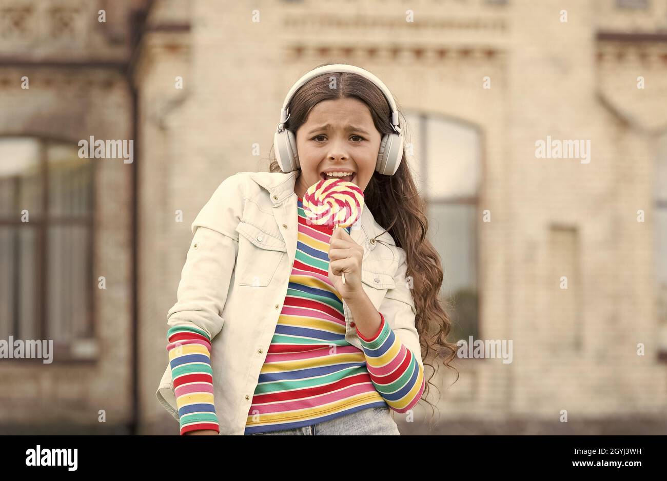 Girl modern headphones sing song lollipop mic, talented singer concept ...