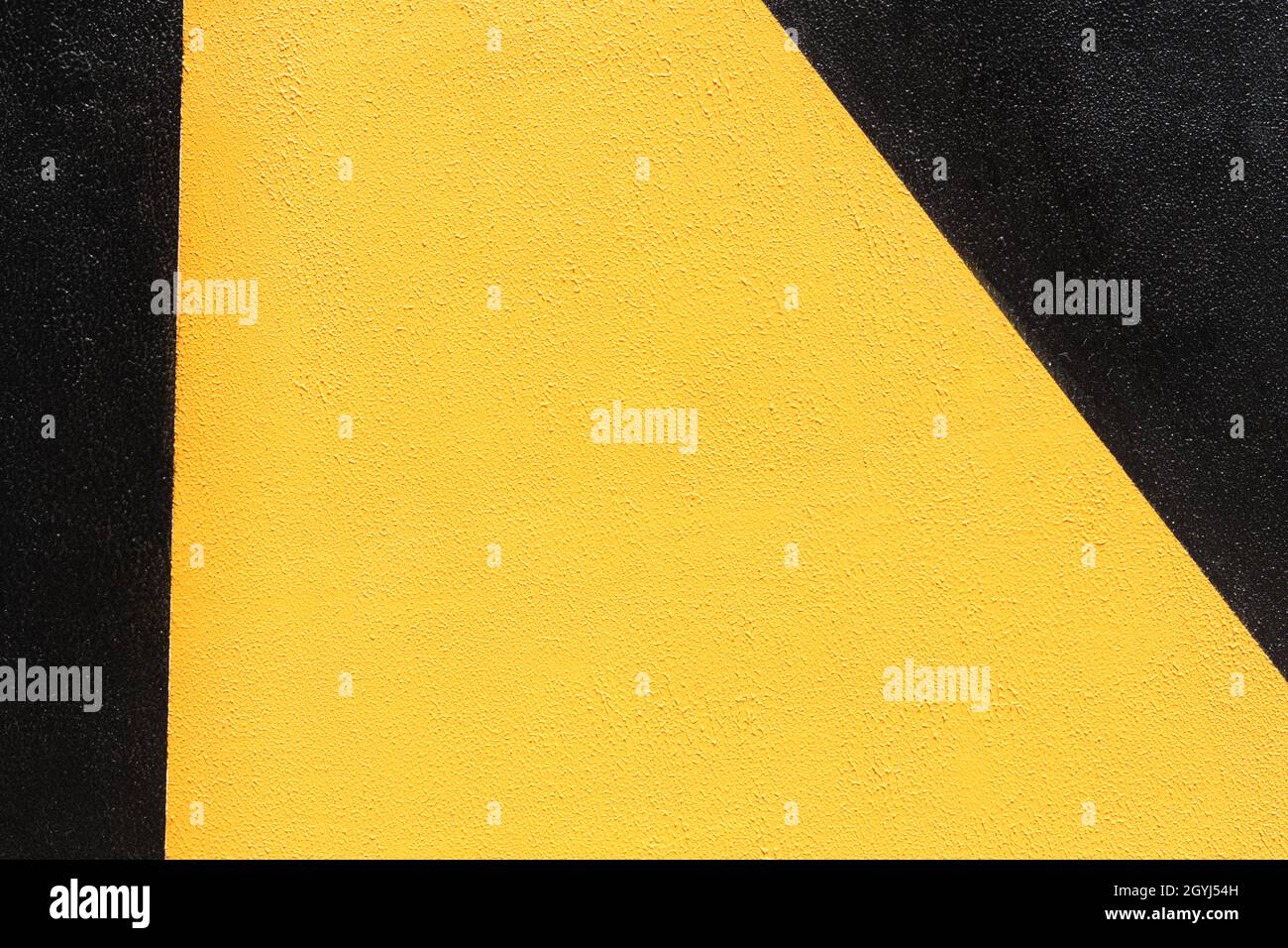 duo colored black and yellow urban wall texture Stock Photo - Alamy
