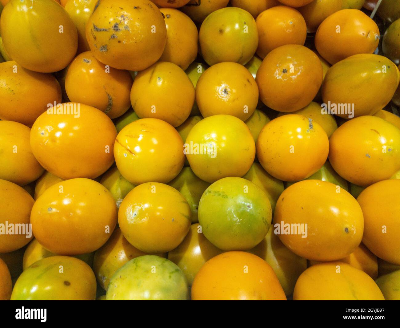 Closeup of yellow passion fruit Stock Photo - Alamy