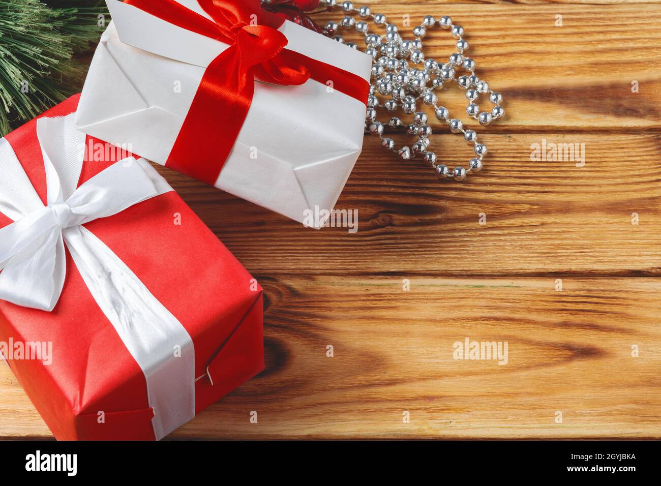 top view of wrapped christmas gift boxes on wooden background Stock ...