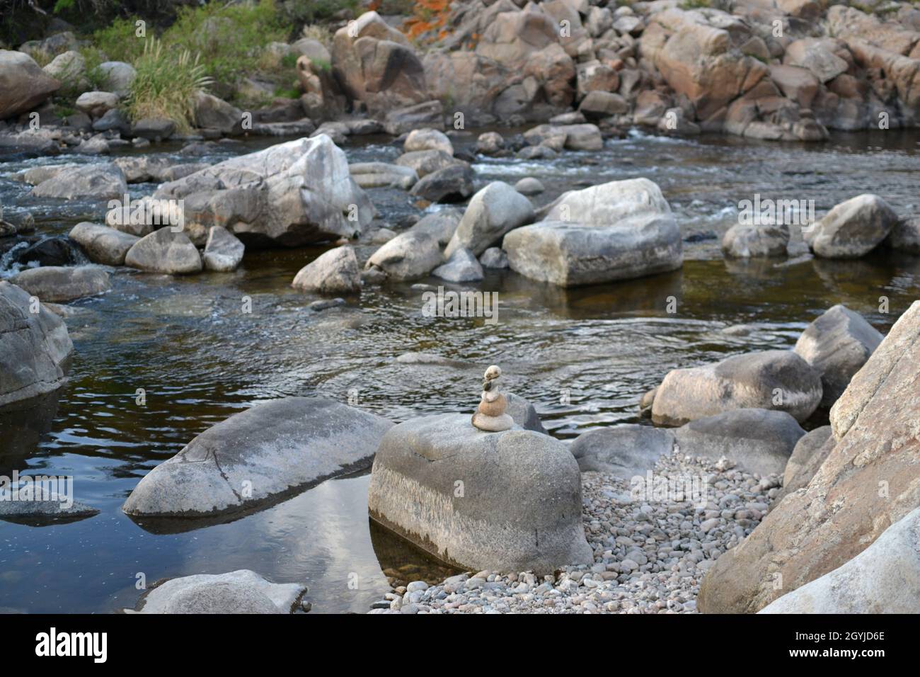 Horizontal shot of stones in the river Stock Photo - Alamy