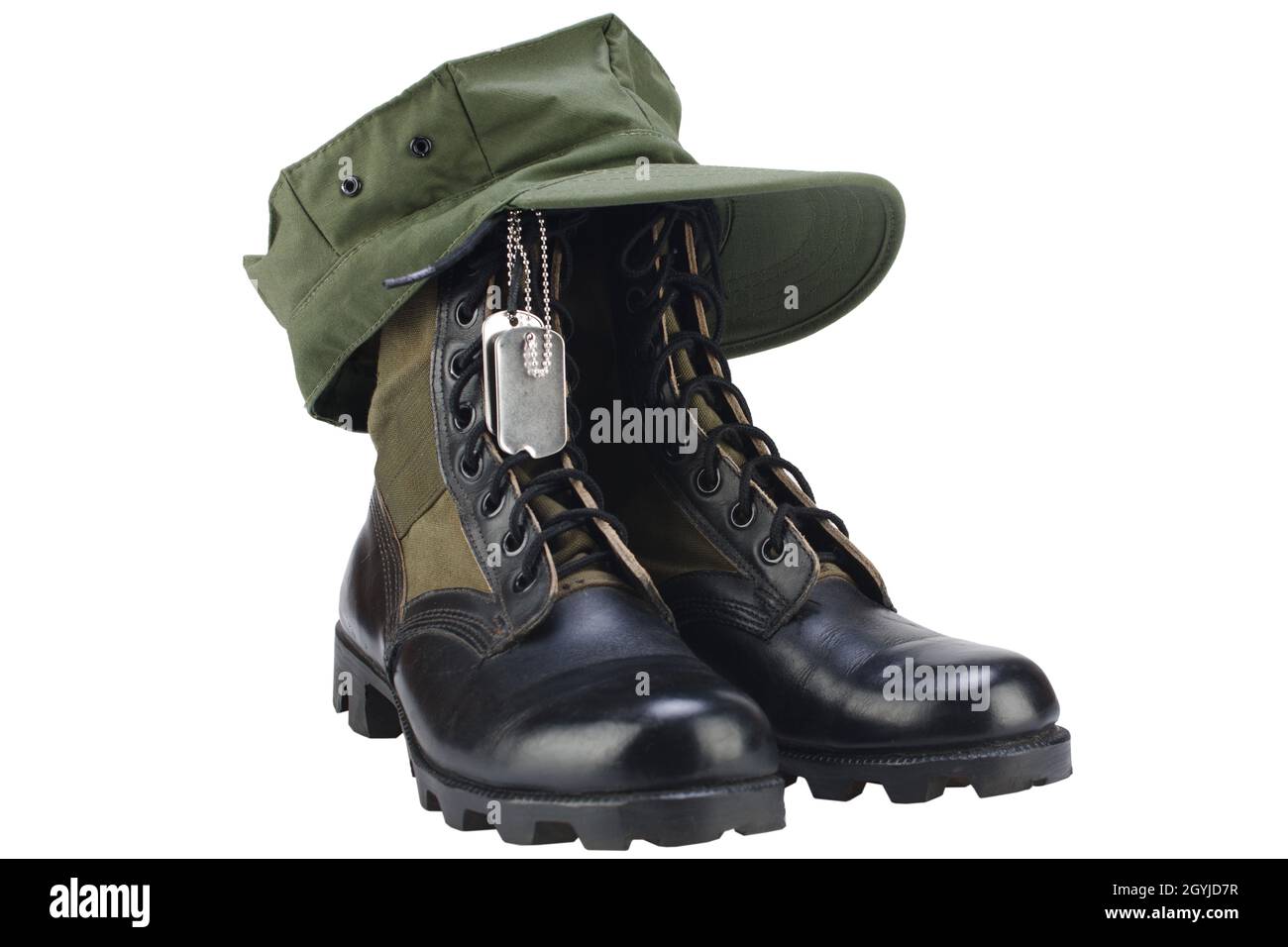 U.S. MARINES boots and cap with dog tags isolated on white background ...