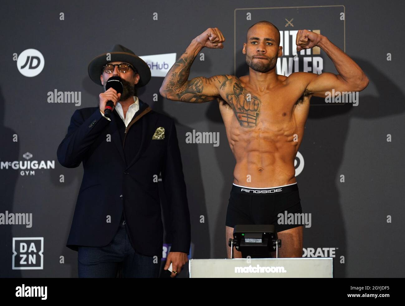 Troy Williamson (right) during a public weigh-in at the Hilton ...