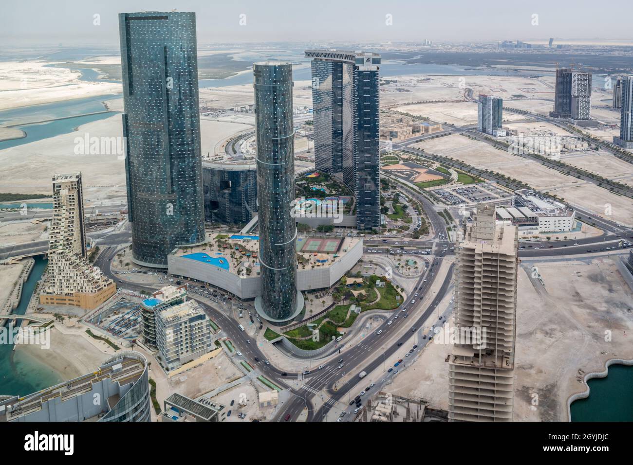 Aerial drone shot of Al Reem island buildings - Gate towers, Sun and ...